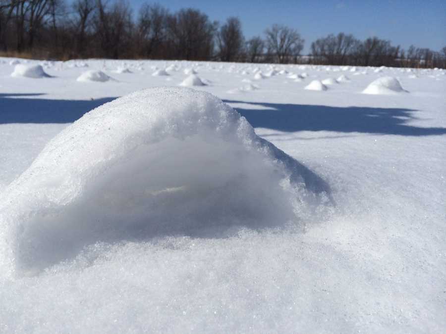 Rare 'snow rollers' form in Iowa
