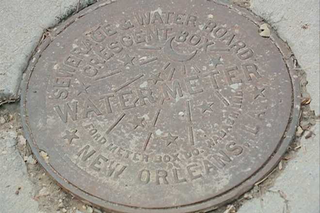 Woman steals iconic water meter covers Uptown